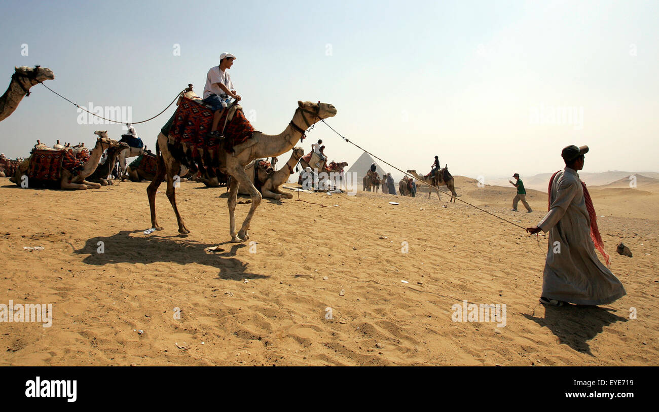 Egyptians riding camels hi-res stock photography and images - Alamy