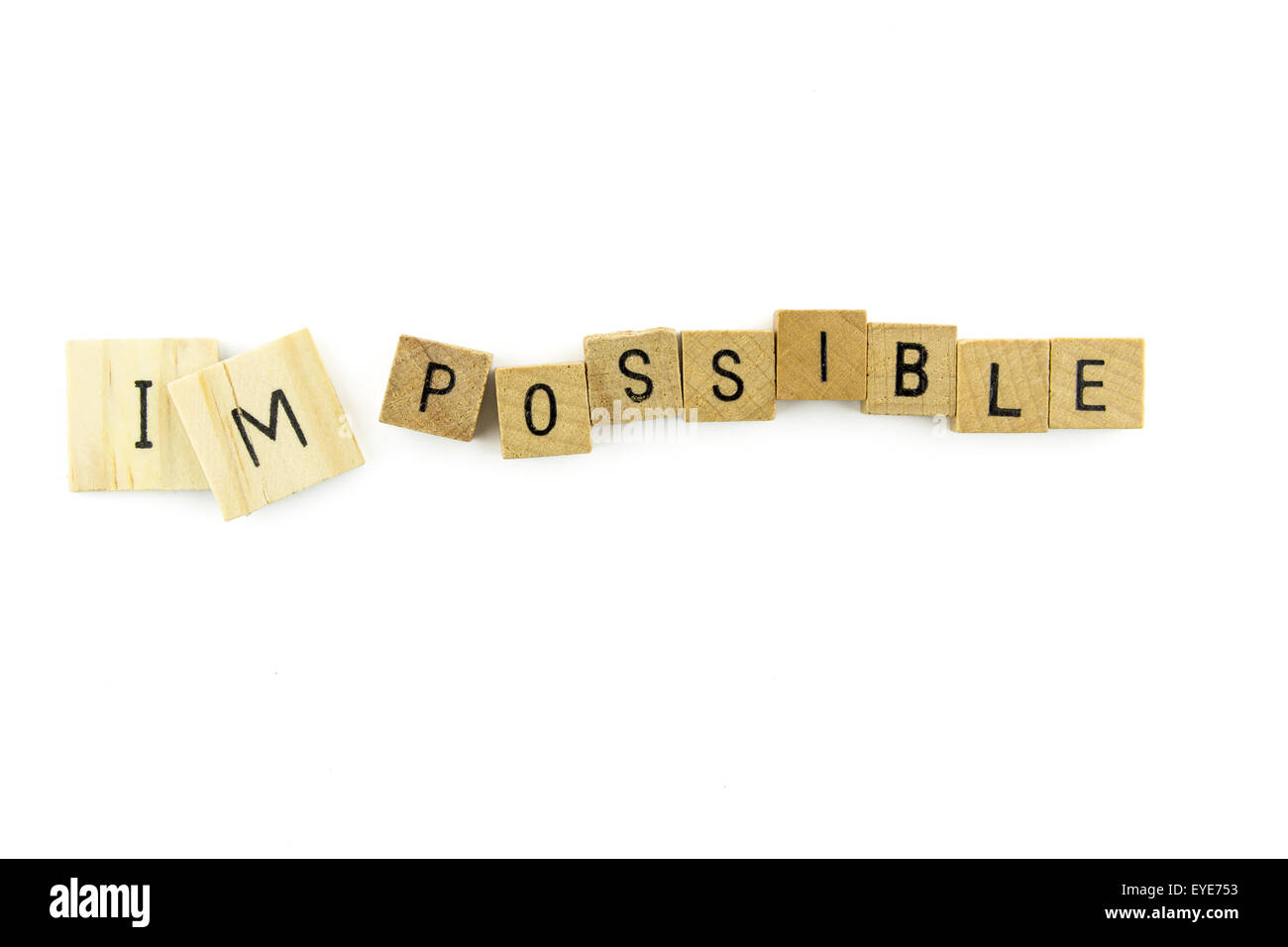 Impossible word wooden alphabet blocks on white background from top ...