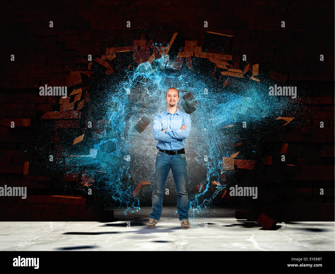 confident man broken brick wall and water spalsh explosion Stock Photo ...