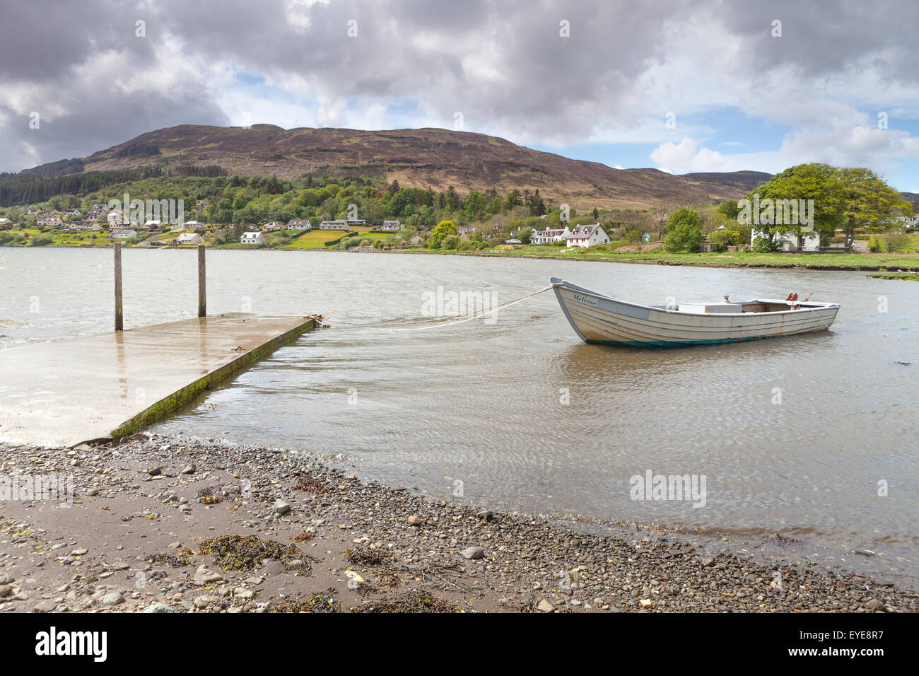 Wooden fishing boat moored in water looking towards Sulaisiadar Mor ...