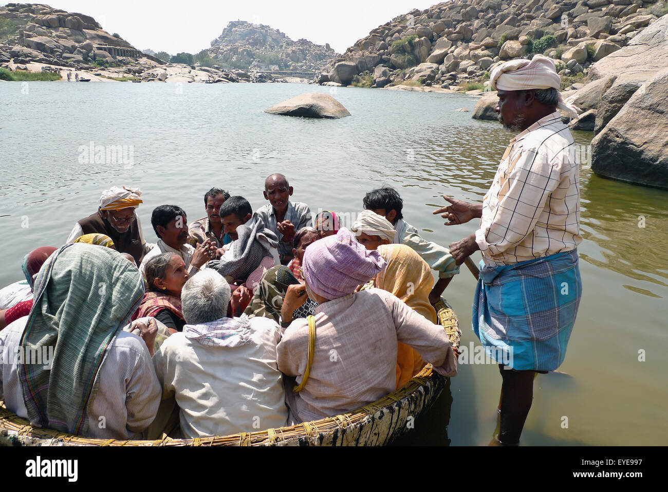 Pilgrims Float In Conical Boat Made Of Bamboo Along The Tungabhadra ...