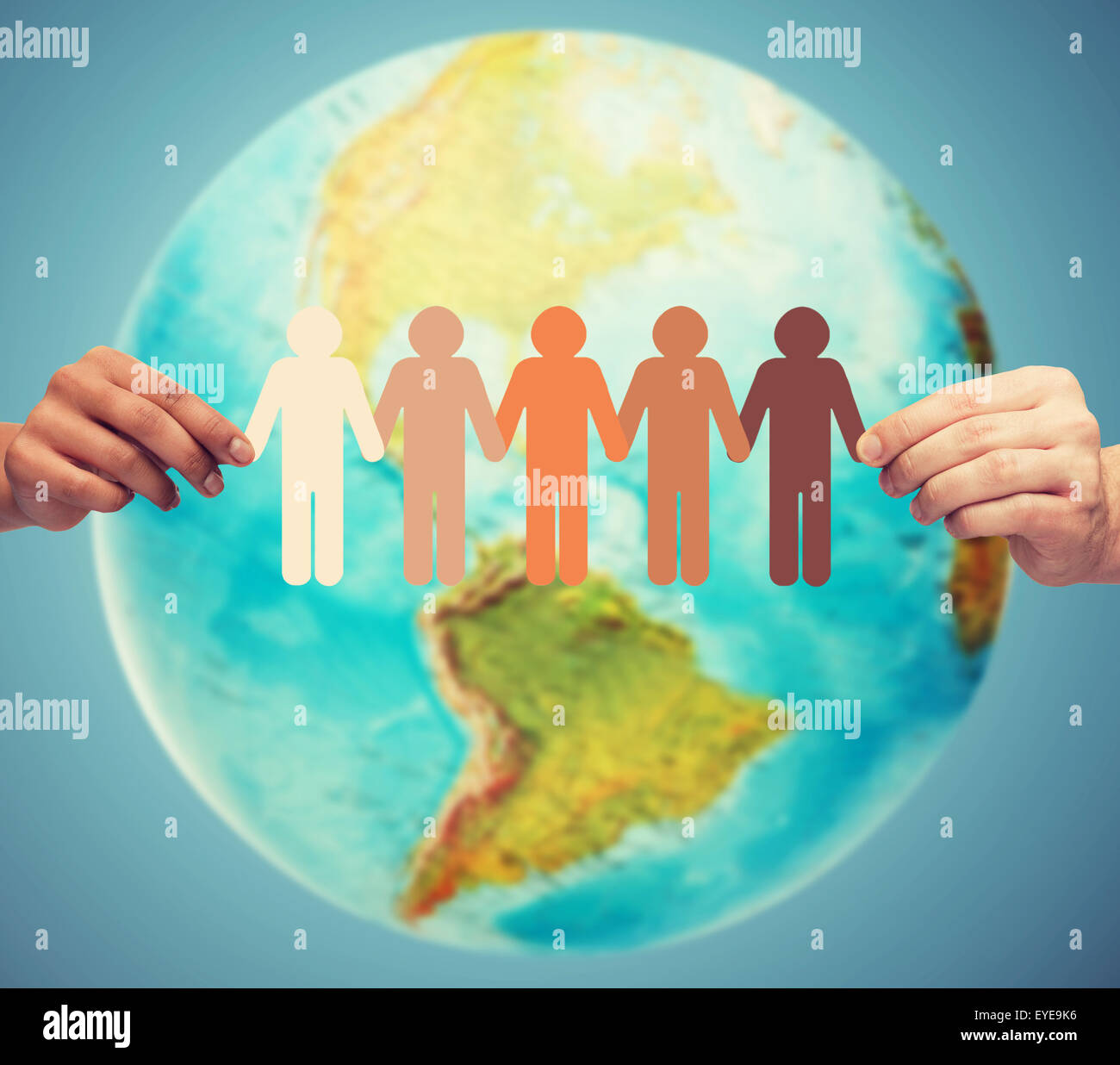 Multiracial hands earth globe hi-res stock photography and images - Alamy