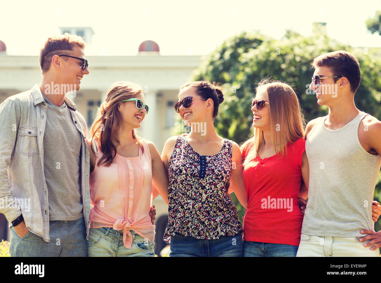 group of smiling friends outdoors Stock Photo - Alamy