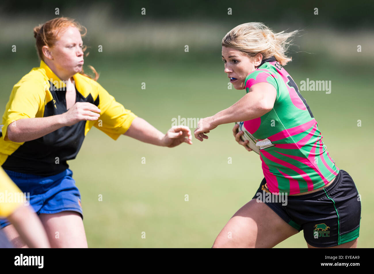 Female rugby players in action Stock Photo - Alamy