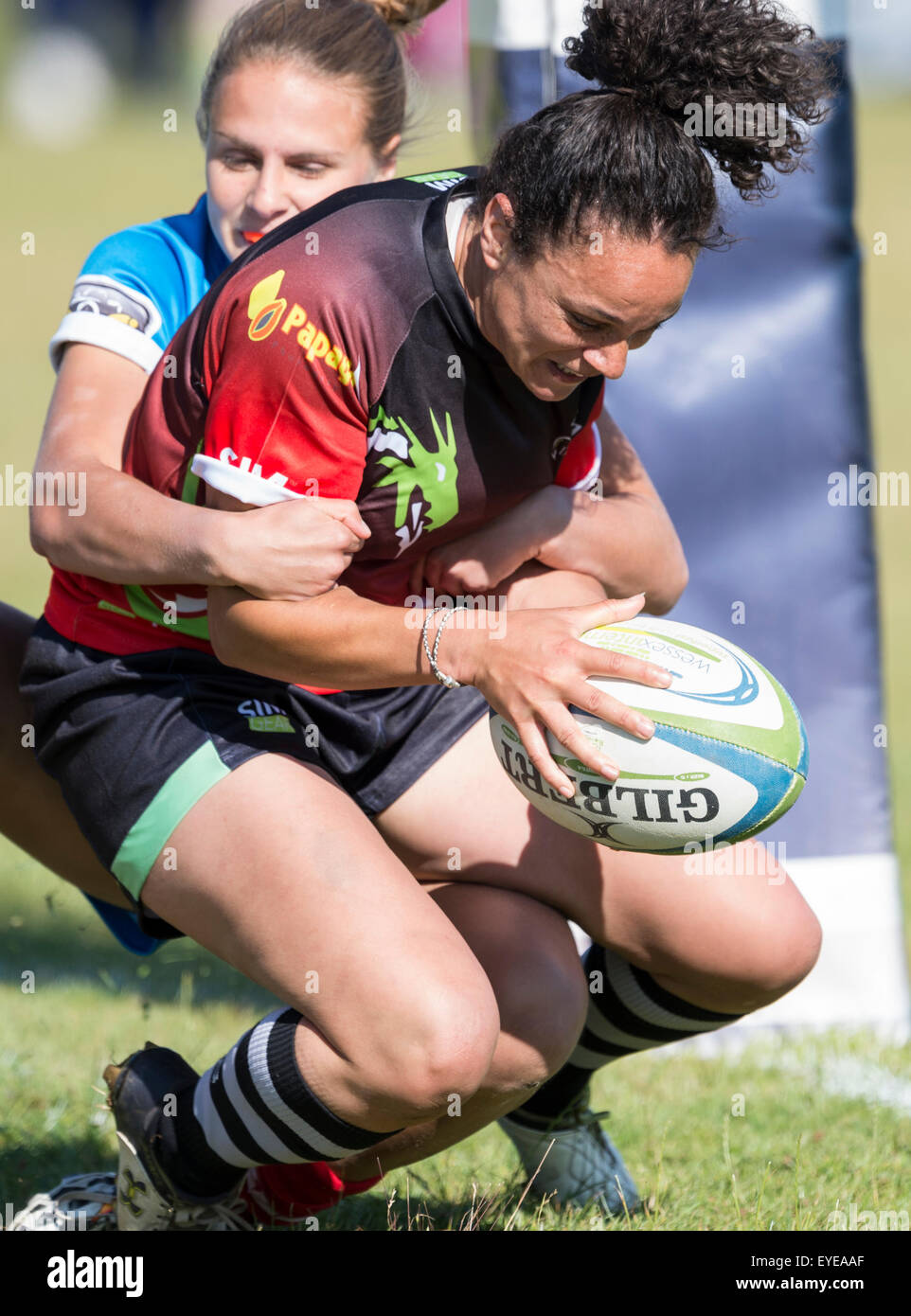 Female rugby players in action Stock Photo - Alamy
