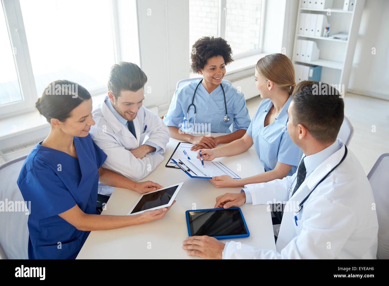 group of happy doctors meeting at hospital office Stock Photo - Alamy