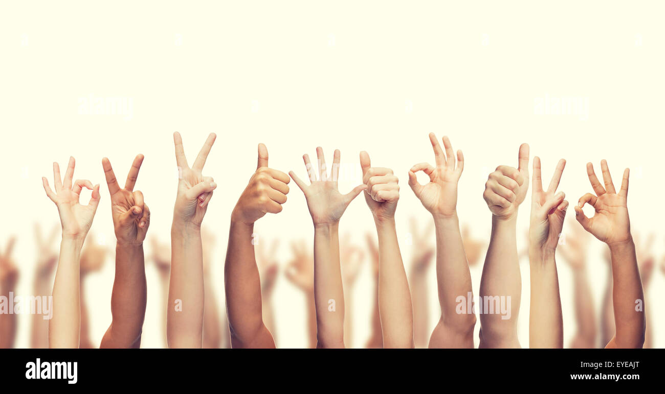 Group of people showing signs hi-res stock photography and images - Alamy