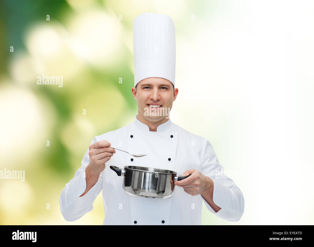 happy male chef cook with pot and spoon Stock Photo - Alamy