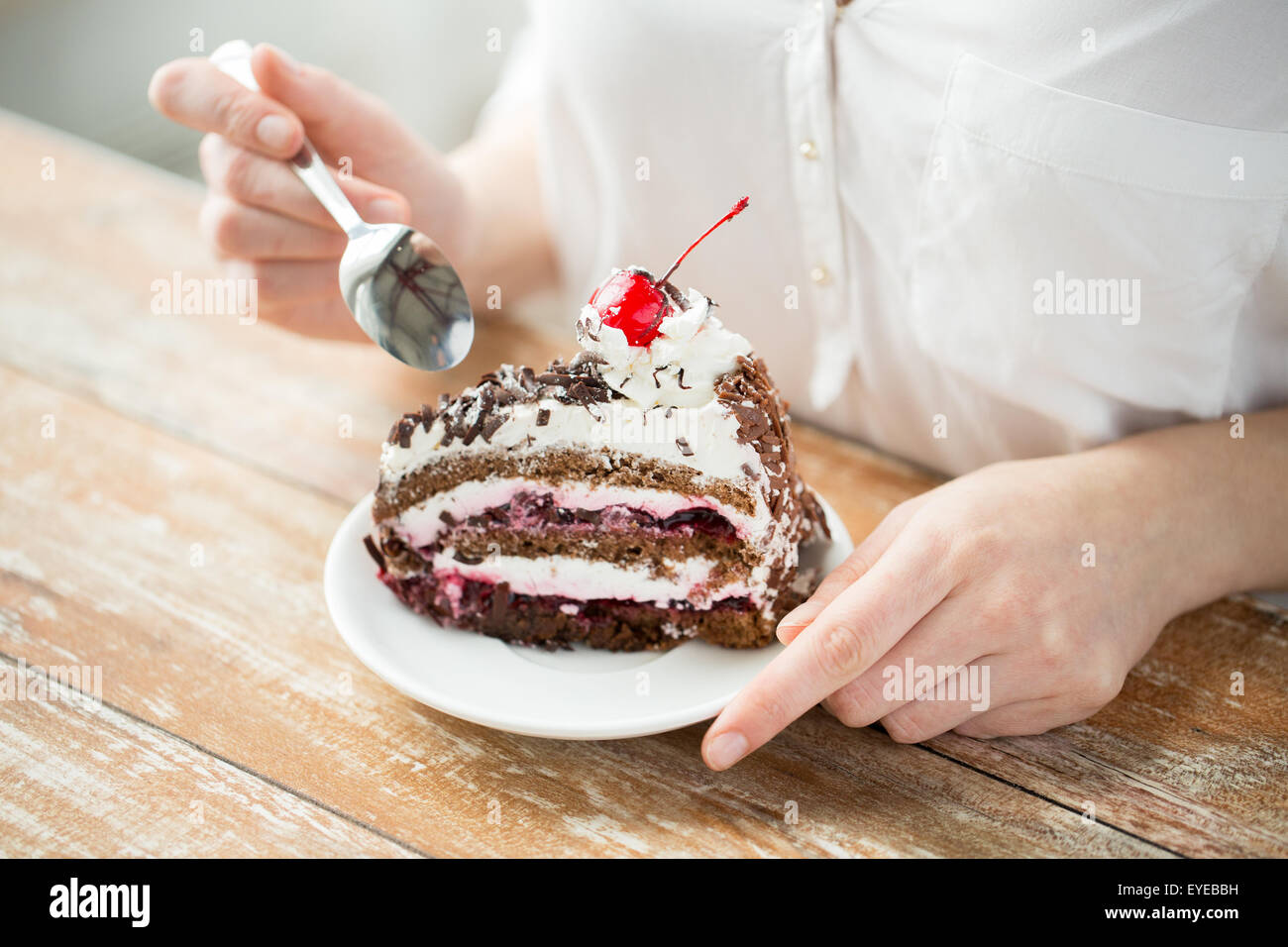 Fat woman eating cake hi-res stock photography and images - Alamy