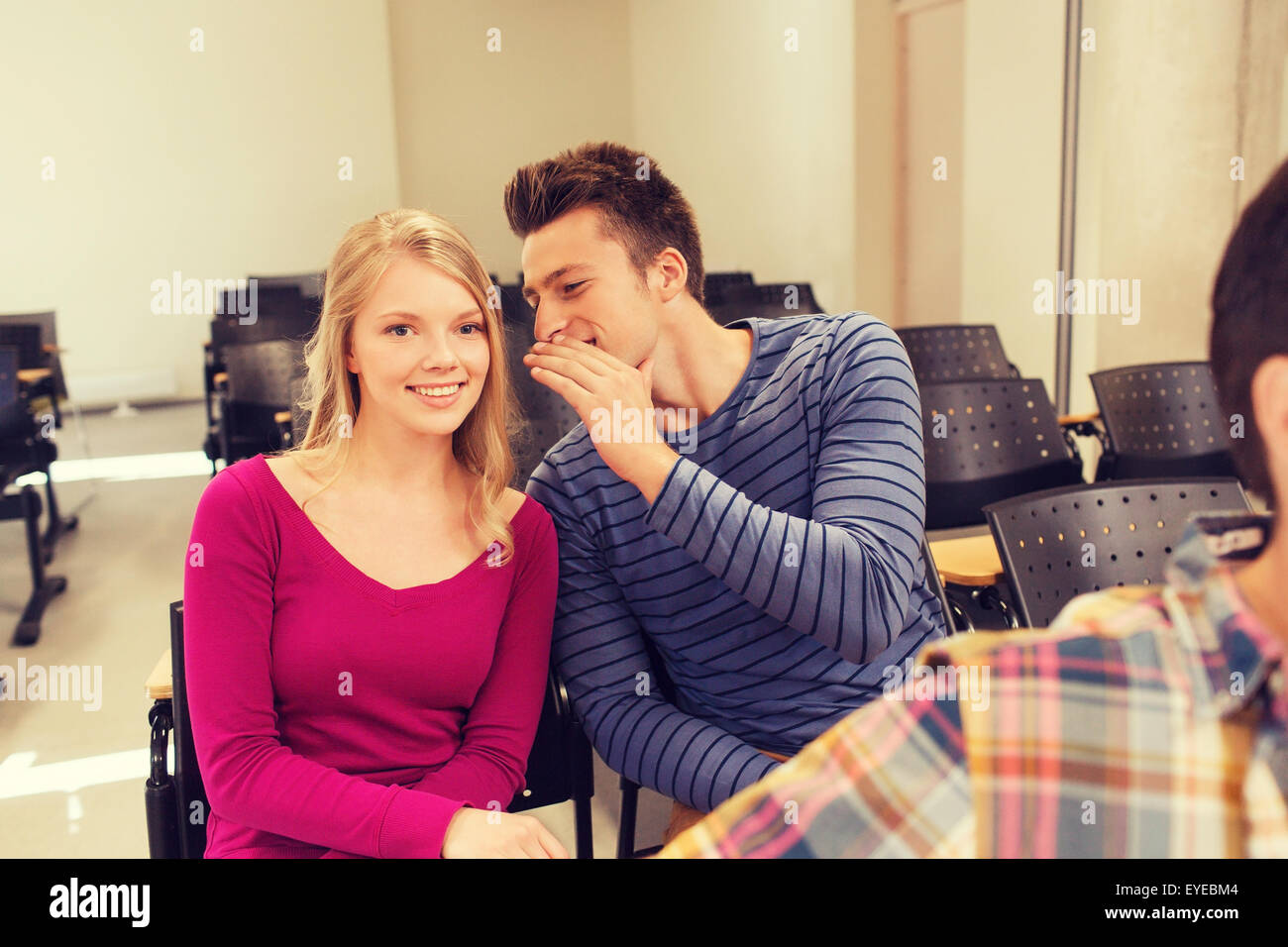 group of smiling students in lecture hall Stock Photo - Alamy