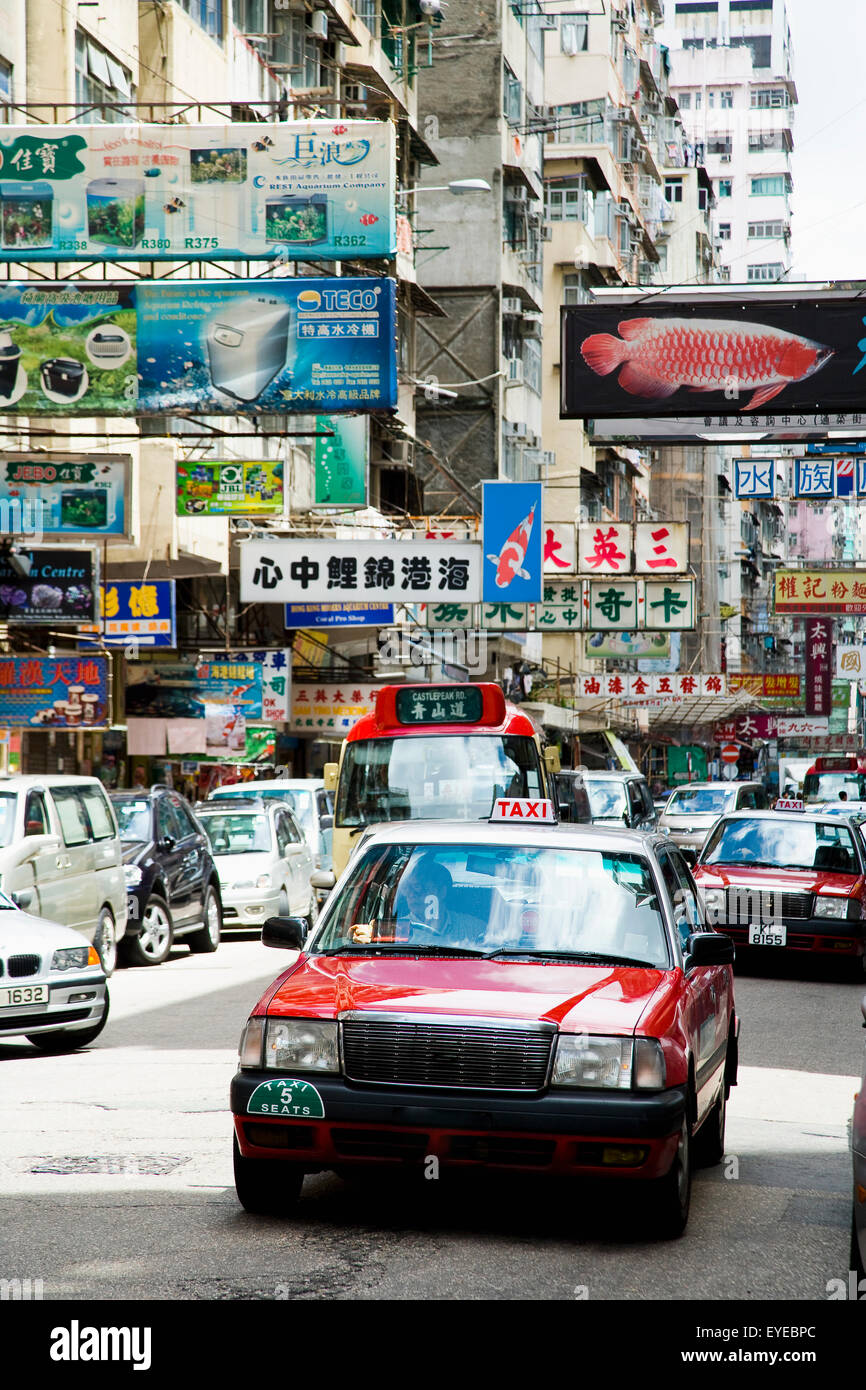 China, Hong Kong, Streets bustle with taxis and cars; Kowloon Stock ...