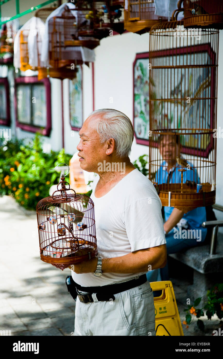 Men man holding bird cage hi-res stock photography and images - Alamy