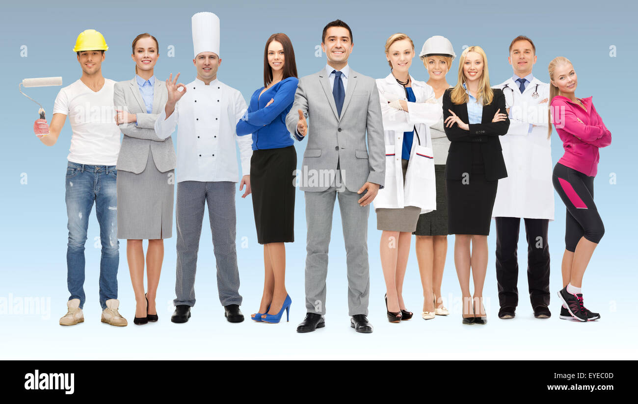 happy businessman over professional workers Stock Photo - Alamy