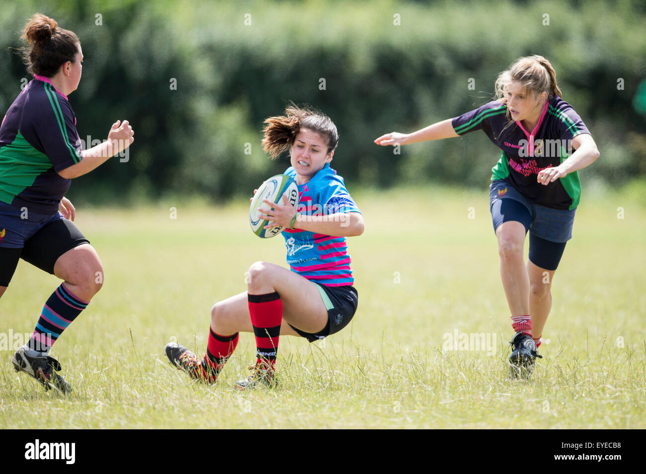 Female rugby players in action hi-res stock photography and images - Alamy