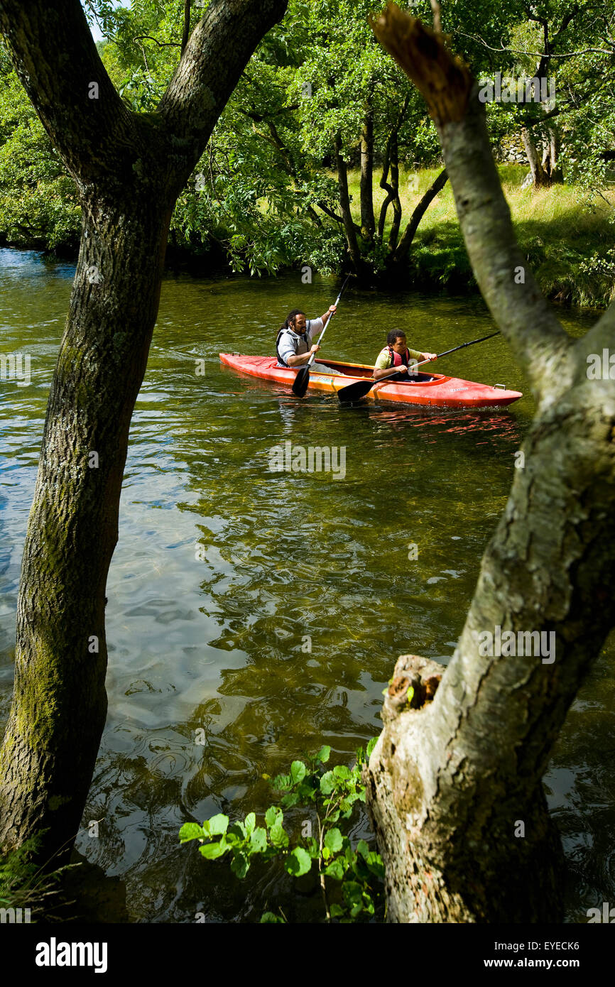 UK, Wales, North Wales, Snowdonia National Park, People kayaking near ...