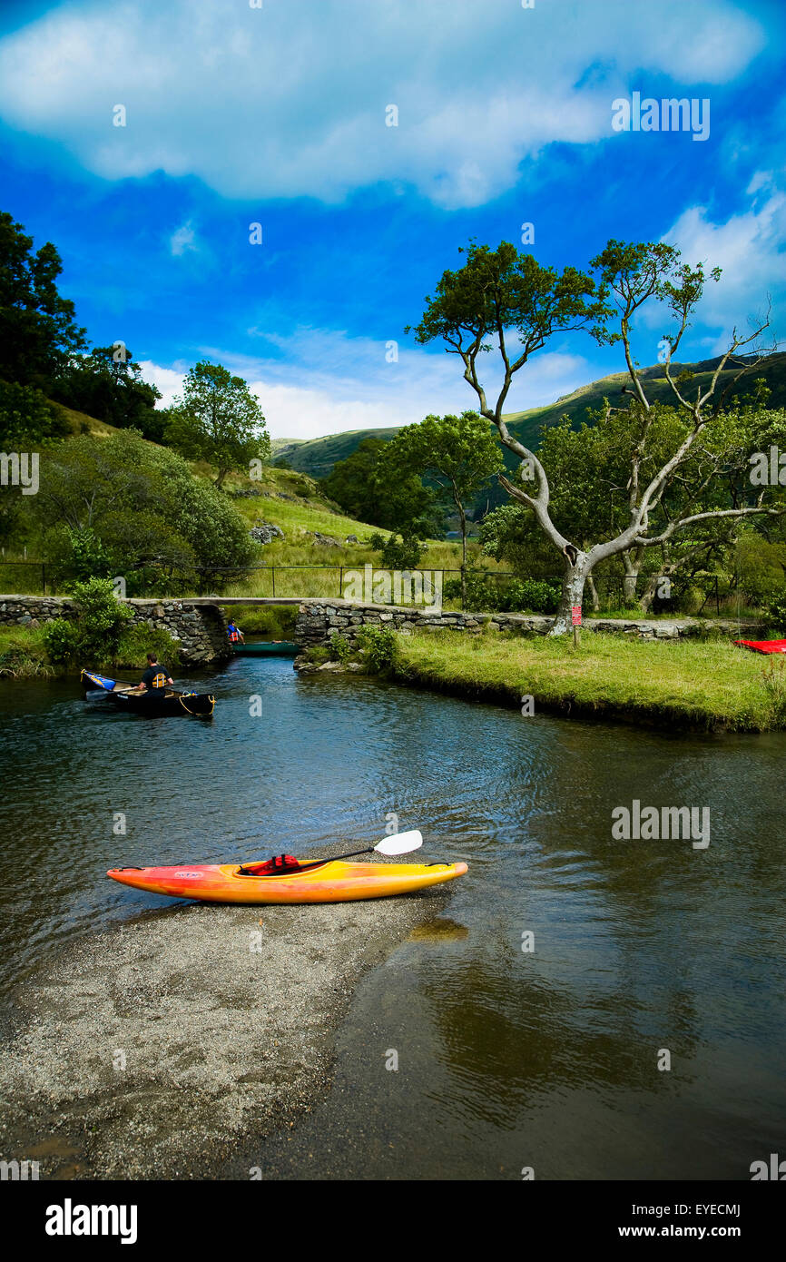 UK, Wales, North Wales, Snowdonia National Park, Canoeing at river near ...