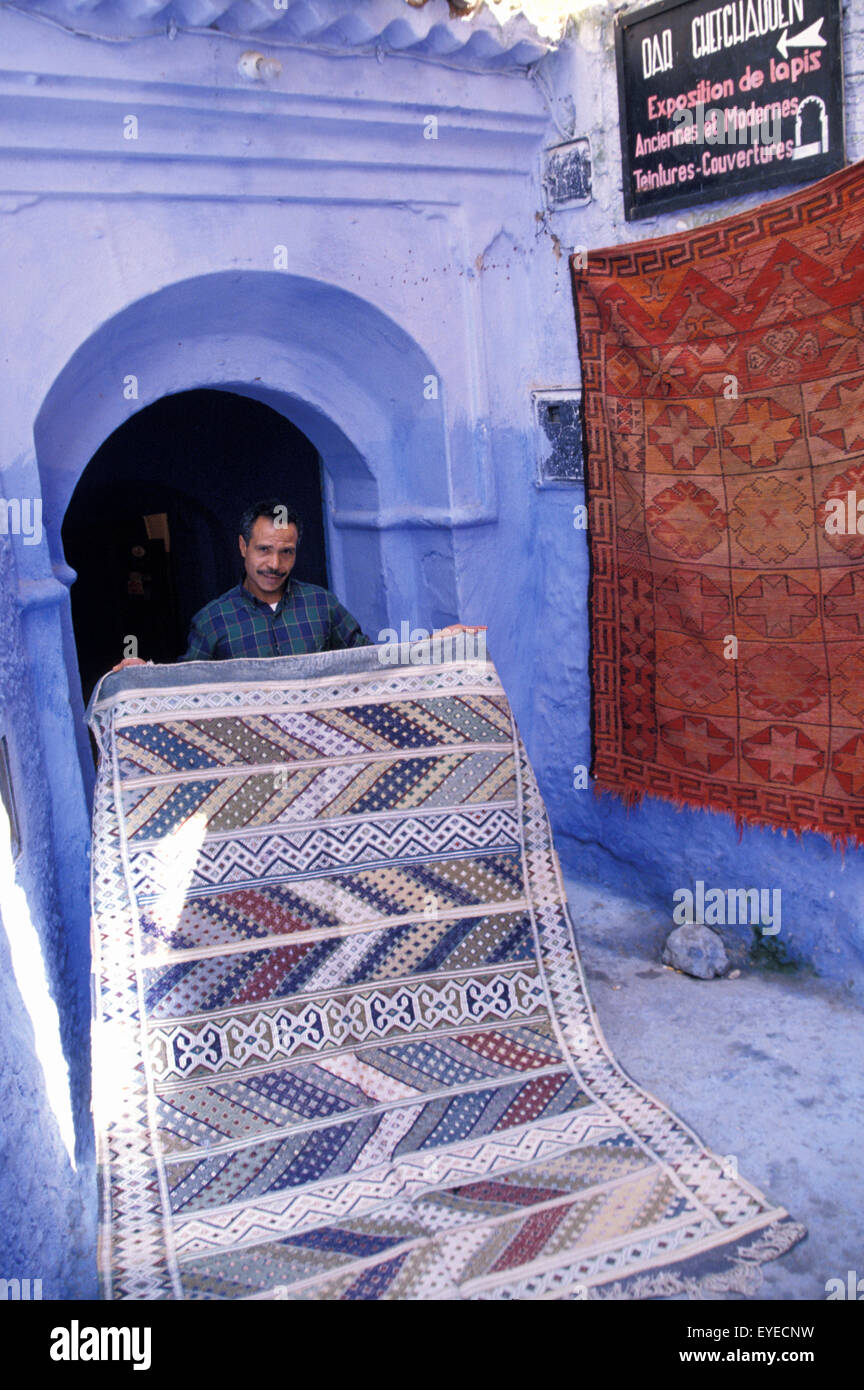 Local Selling Carpet In Market, Streets Of Chaouen (Chefchaouen Or ...
