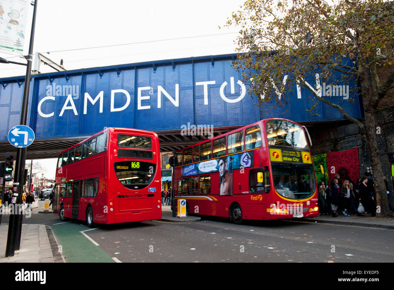 Double Decker Buses Passing Under The Bridge In Camden Town, North ...