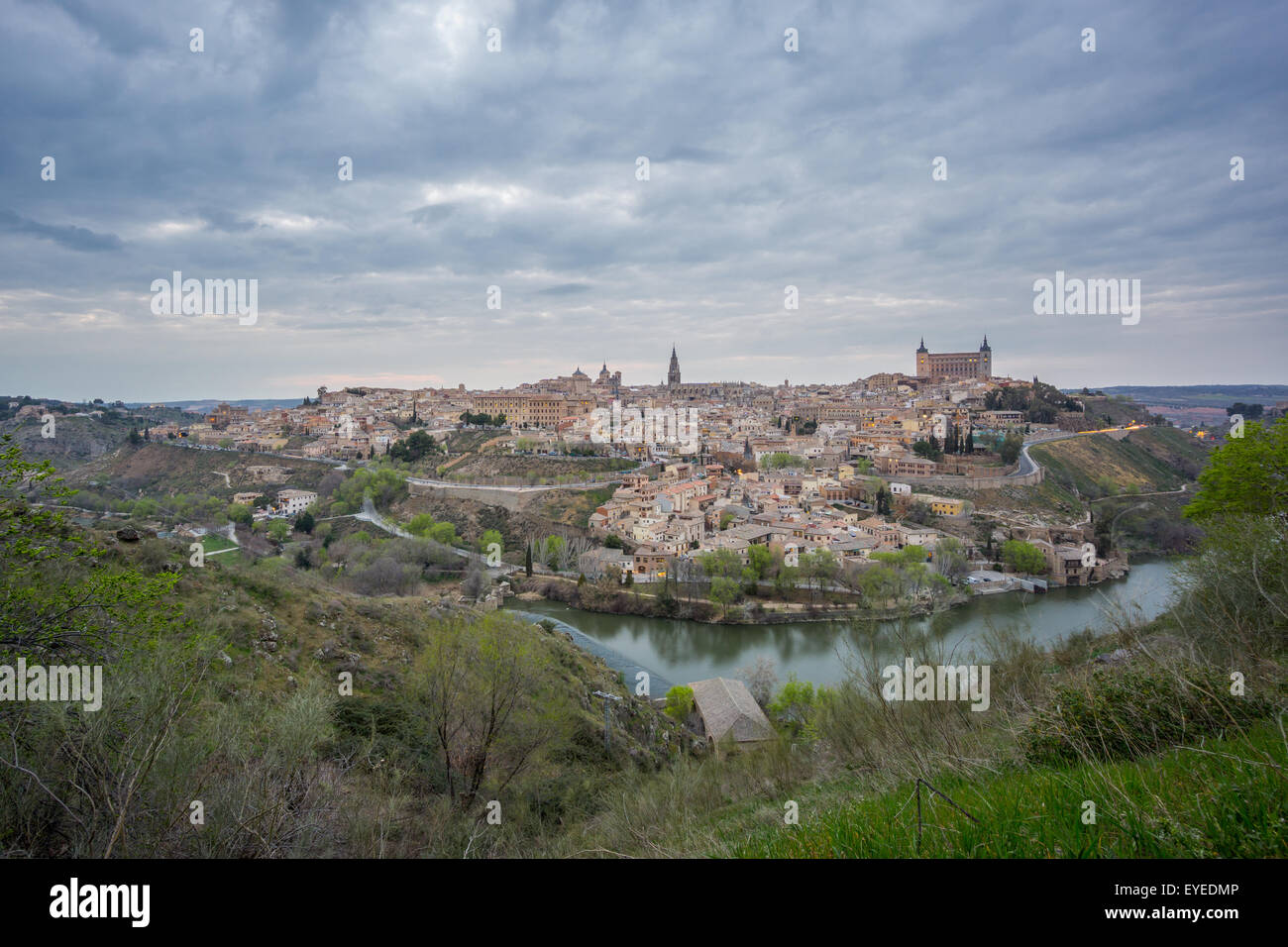 Wide angle view of Toledo with cloudy sky at sunset Stock Photo - Alamy