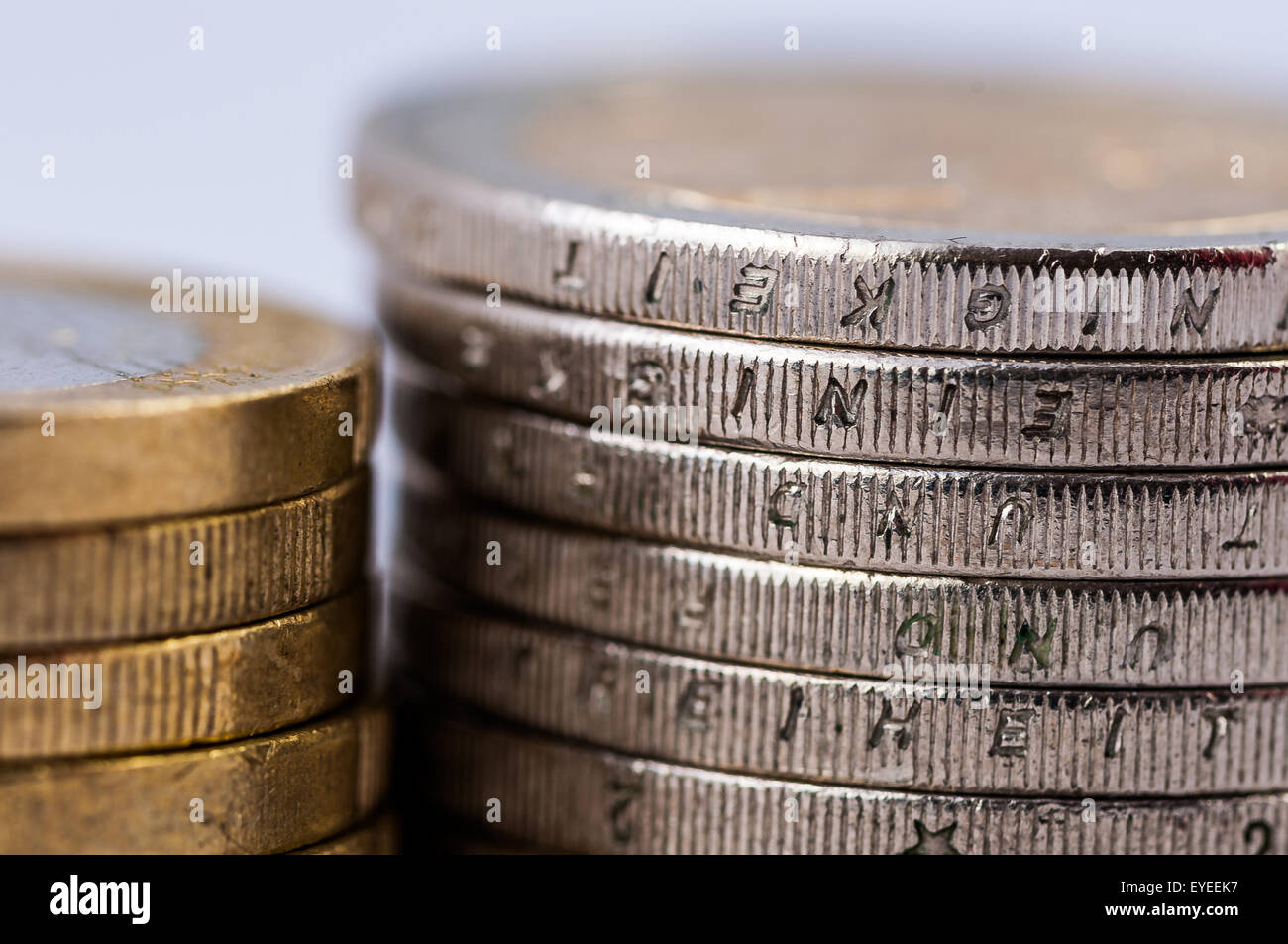 stack of coins on white background isolated Stock Photo - Alamy