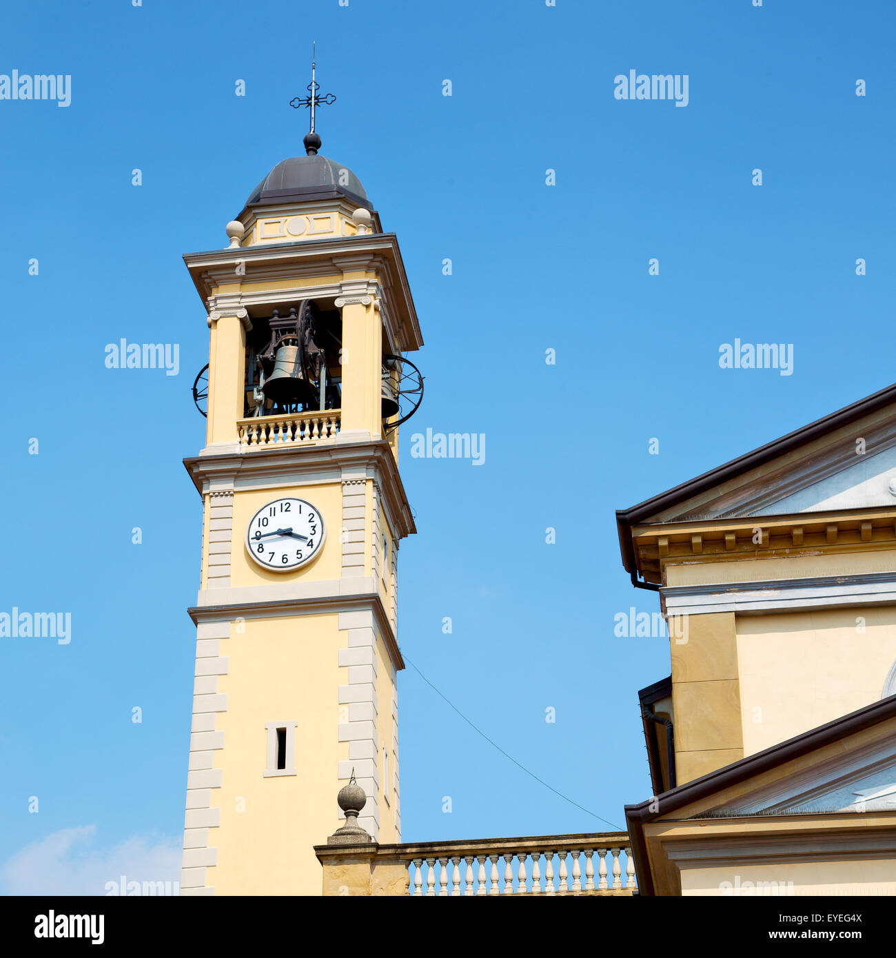 ancien clock tower in italy europe old stone and bell Stock Photo - Alamy