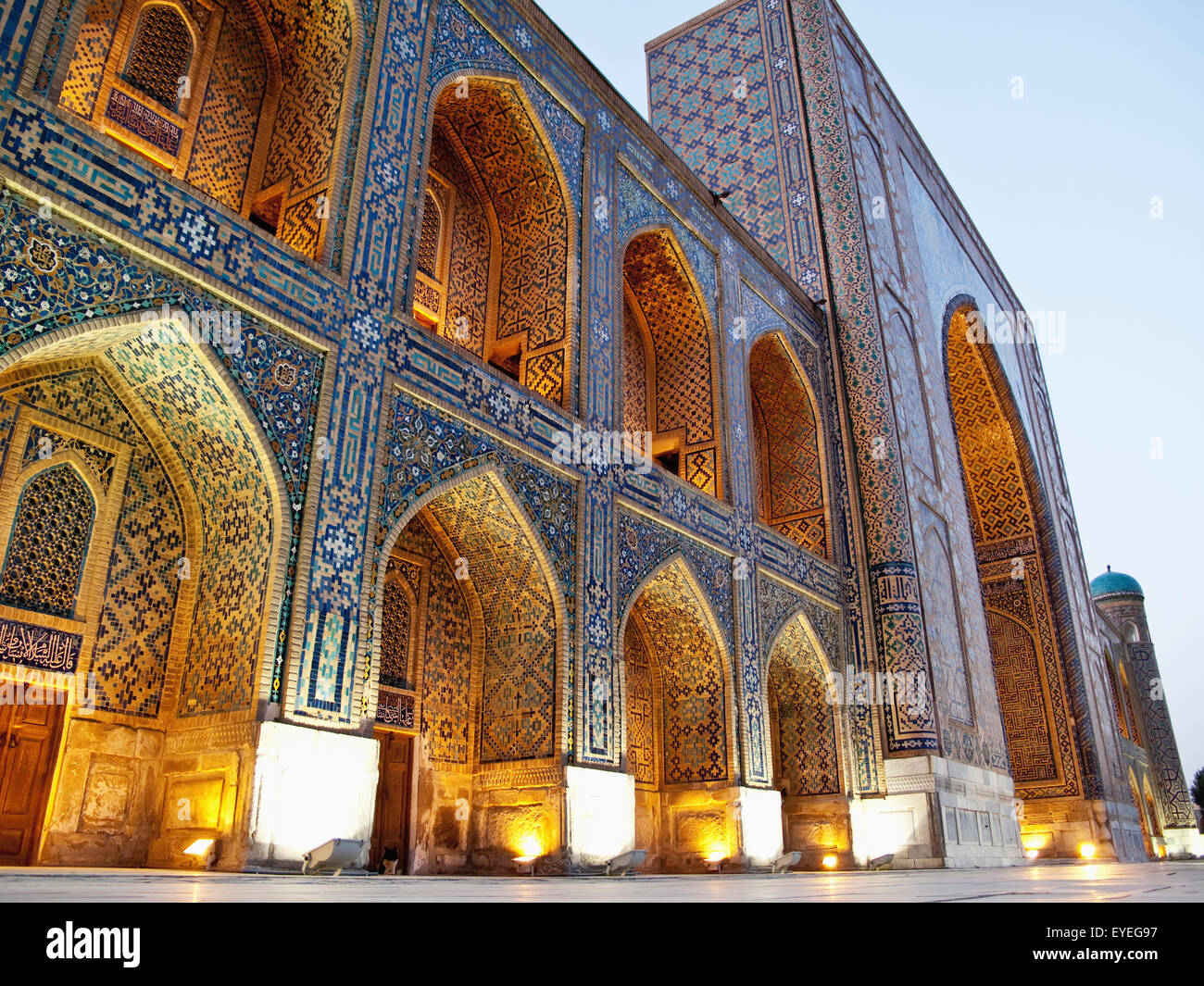 Facade of Tillya Kari Madrassah at dusk, Registan Square; Samarkand ...