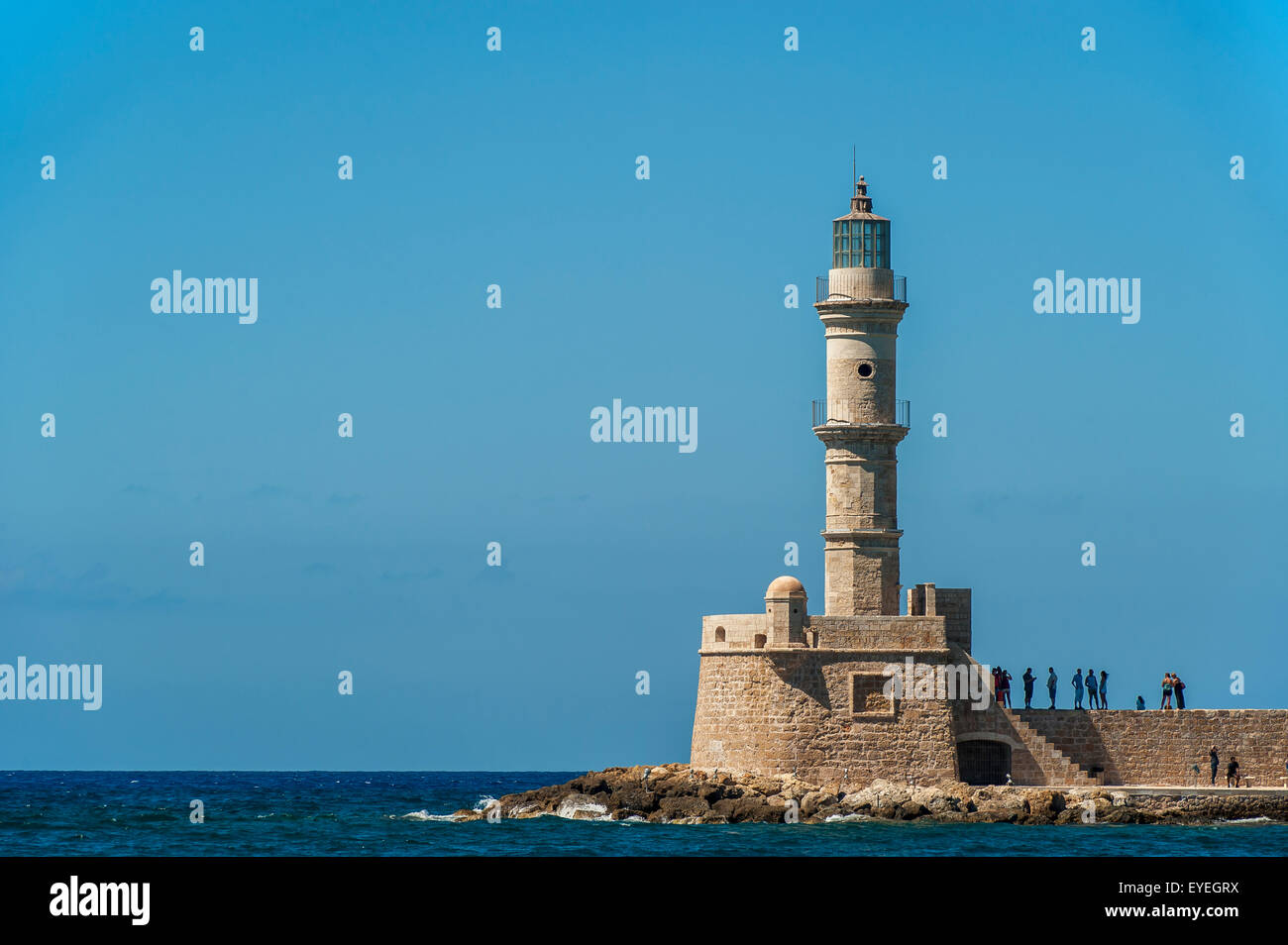 Lighthouse in the Venetian harbour; Chania, Crete, Greece Stock Photo ...