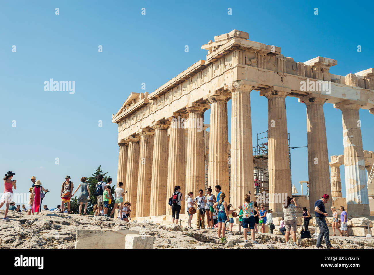 Tourists among the columns of the Acropolis; Athens, Greece Stock Photo ...