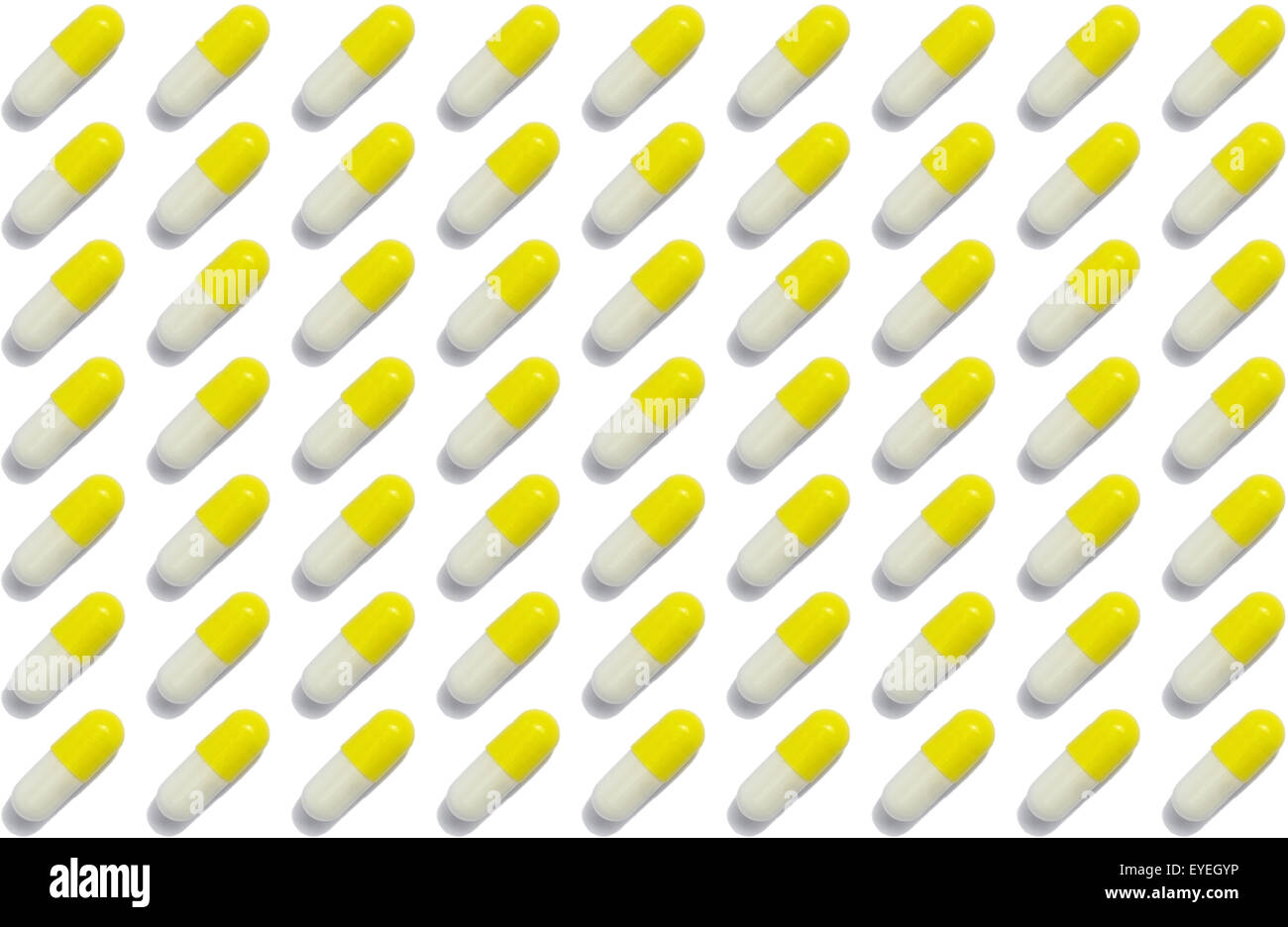 pills / capsules in rows - medicine background Stock Photo - Alamy