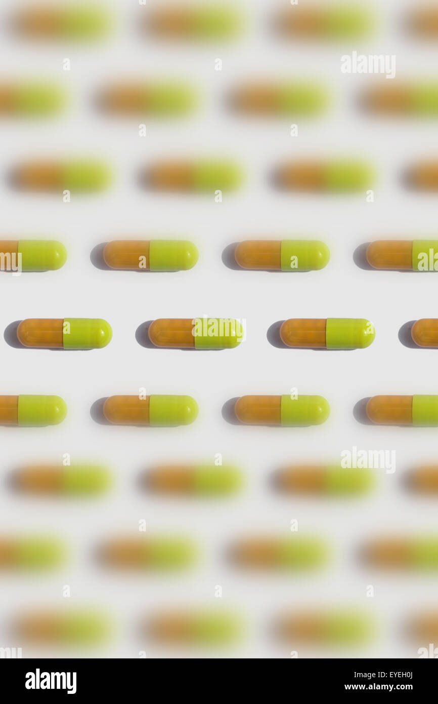 pills / capsules in rows - medicine background Stock Photo - Alamy