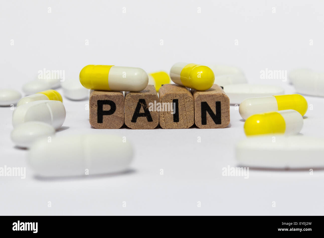 pain capsules pills / tablets on white background Stock Photo - Alamy