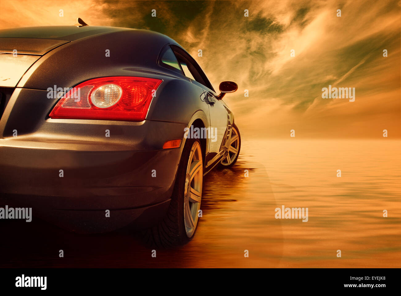 Sport car reflected in water Stock Photo - Alamy