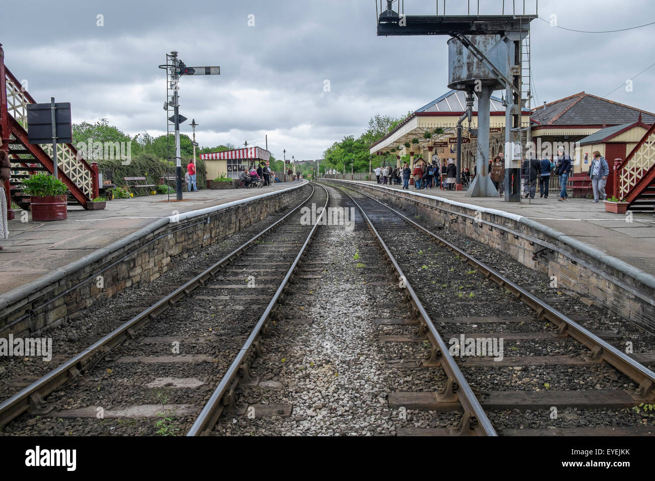 2 Railroad rail lines going through the station with signal at stop ...