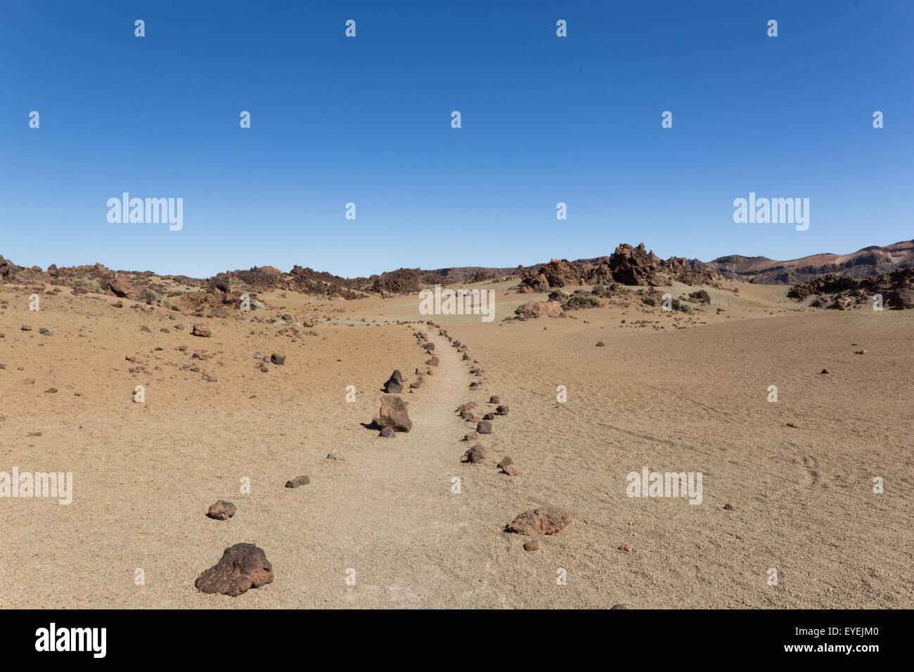 desert landscape - volcano mountain blue sky Stock Photo - Alamy