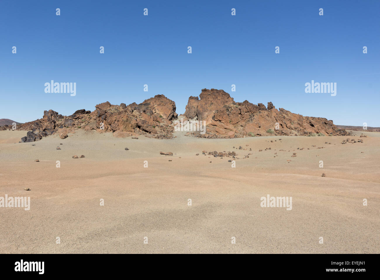 desert landscape - volcano mountain blue sky Stock Photo - Alamy