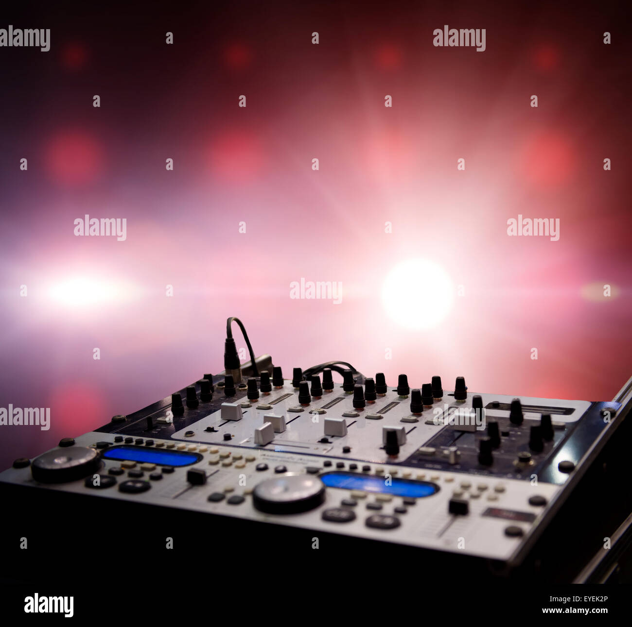 Dj mixer over abstract background Stock Photo - Alamy