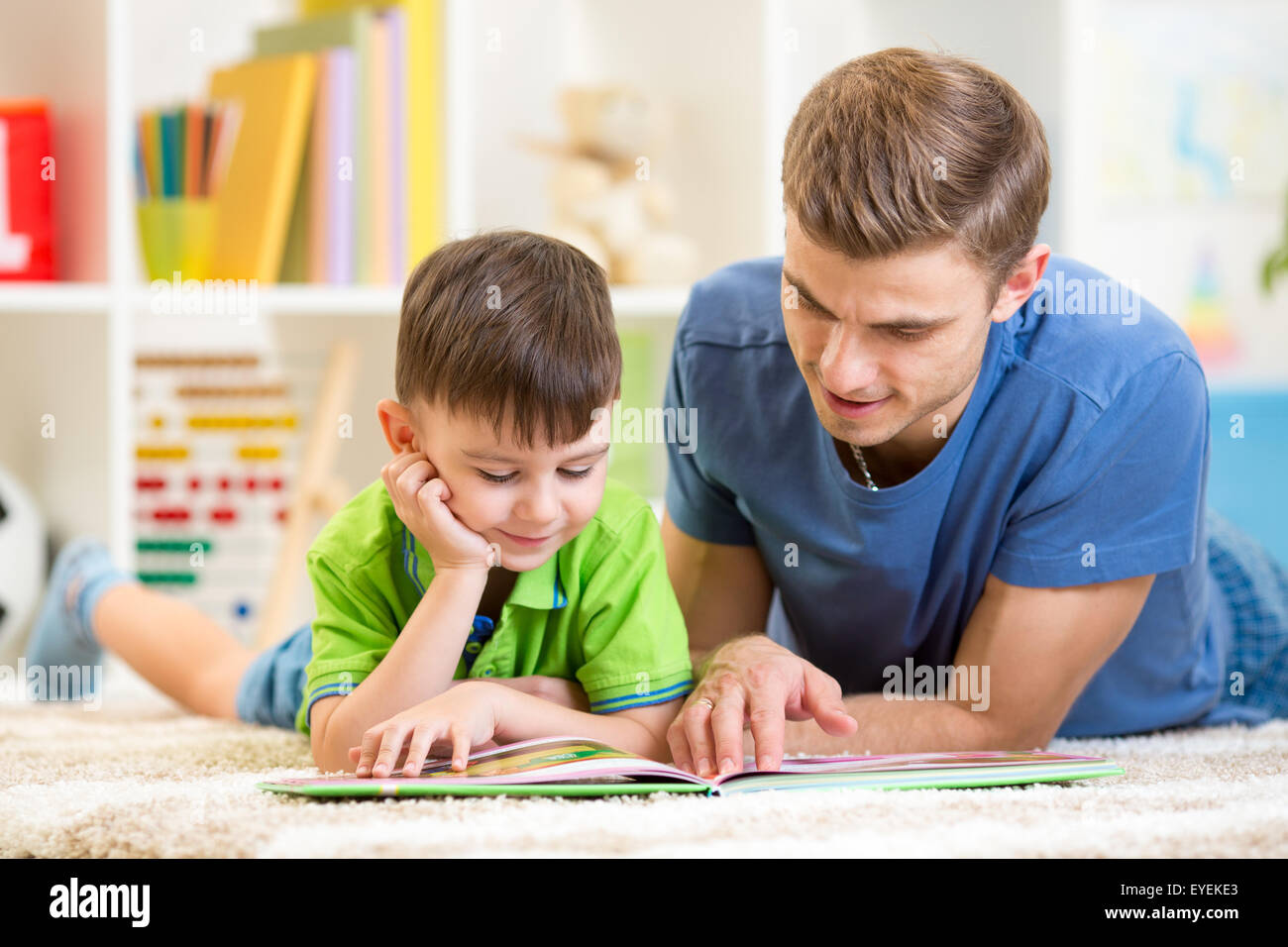 Child portrait friend read book hi-res stock photography and images - Alamy