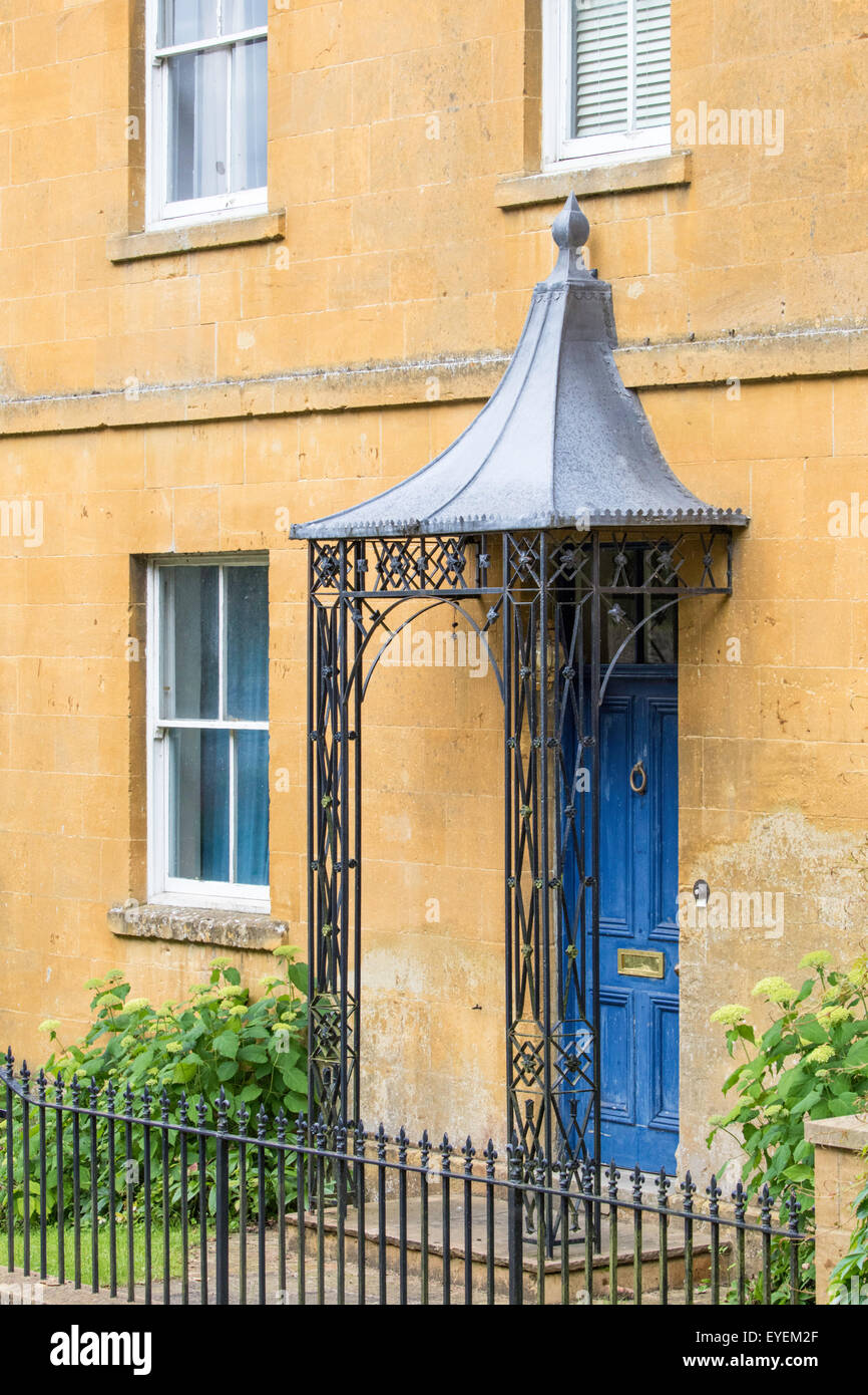 Ornate Edwardian porch on a Cotswold cottage, England, UK Stock Photo ...