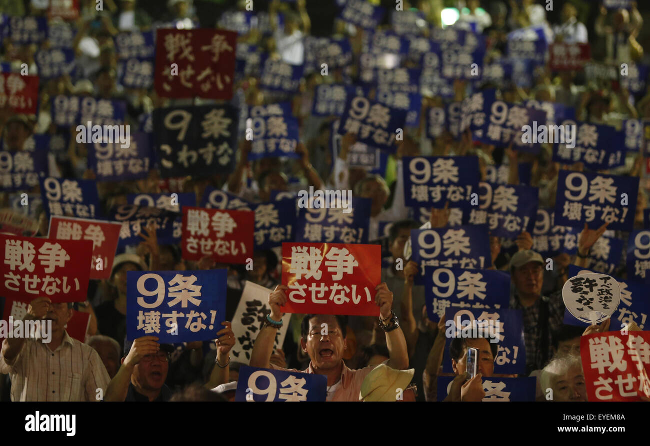 Tokyo, Japan. 28th July, 2015. People attend a rally to protest against ...