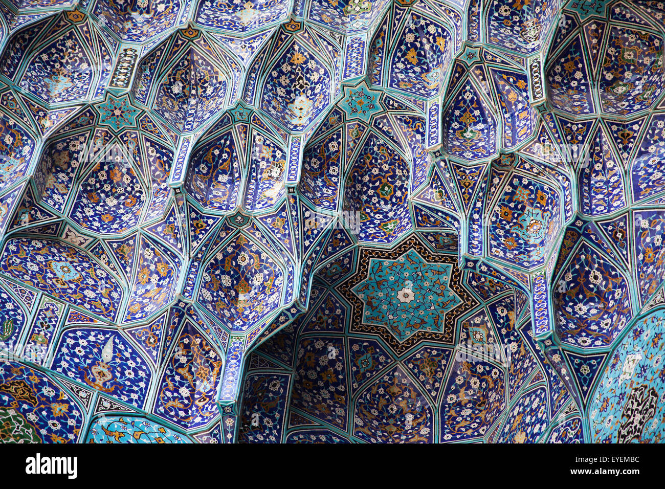 Decorated stalactites (muqarnas) within Iwan entrance to Imam Mosque ...