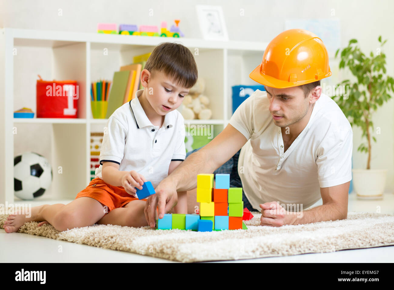 kid boy and father play builders Stock Photo - Alamy