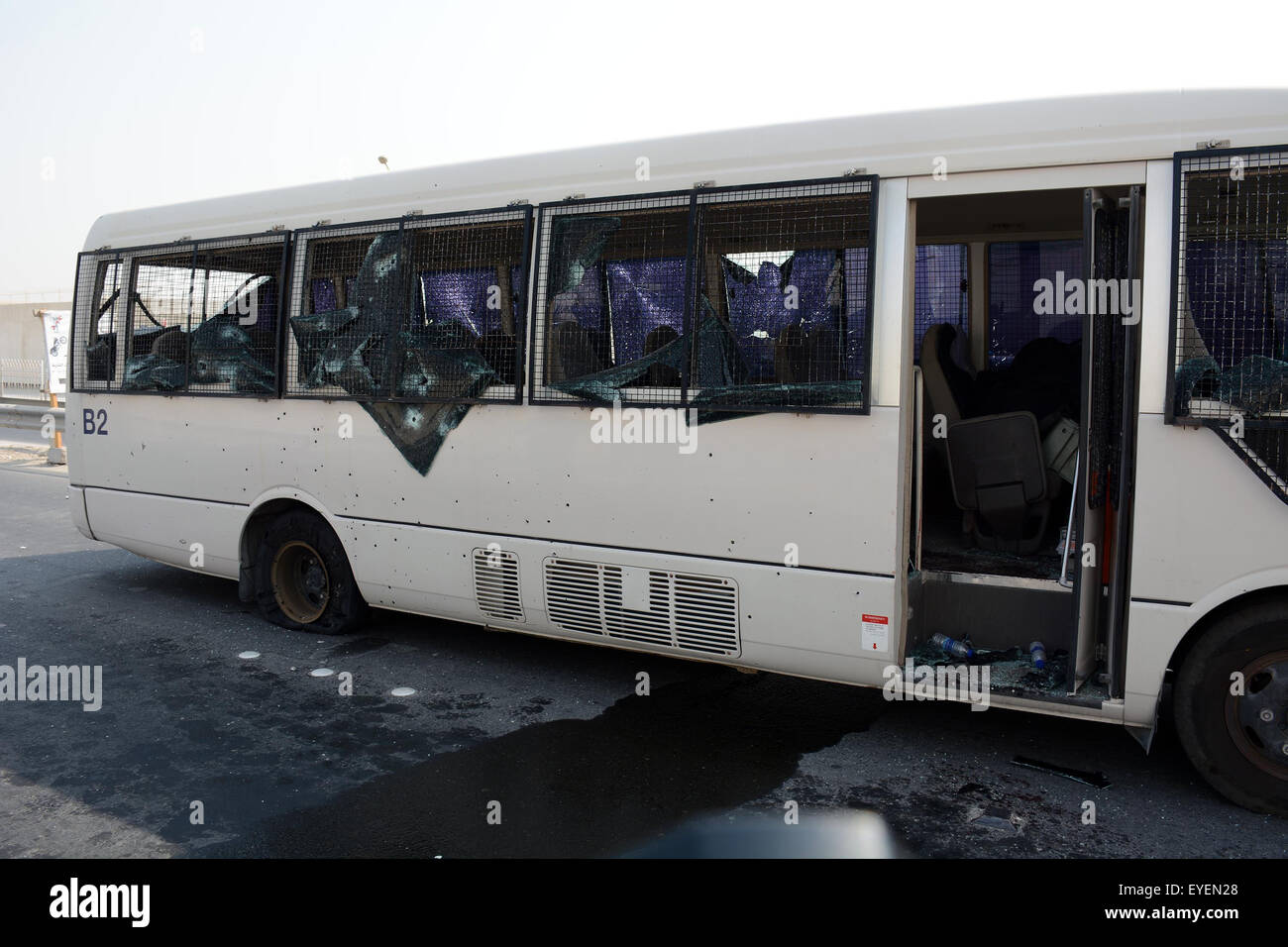 Manama, Bahrain. 28th July, 2015. A damaged vehicle is seen at the site ...