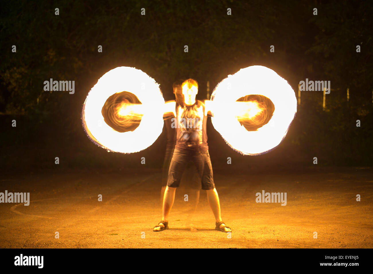 Fire-show man in action Stock Photo - Alamy