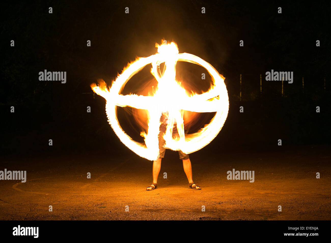 Fire-show man in action Stock Photo - Alamy