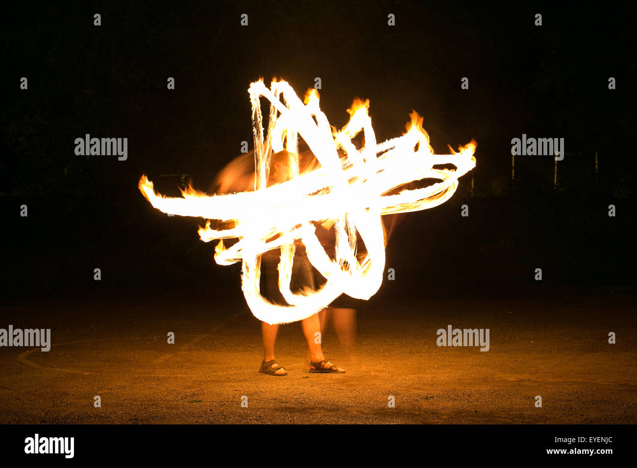Fire-show man in action Stock Photo - Alamy