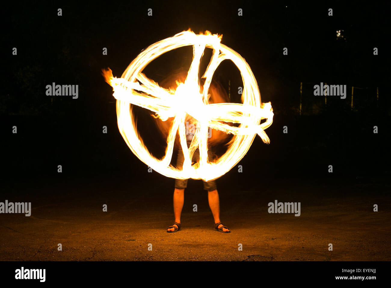 Fire-show man in action Stock Photo - Alamy