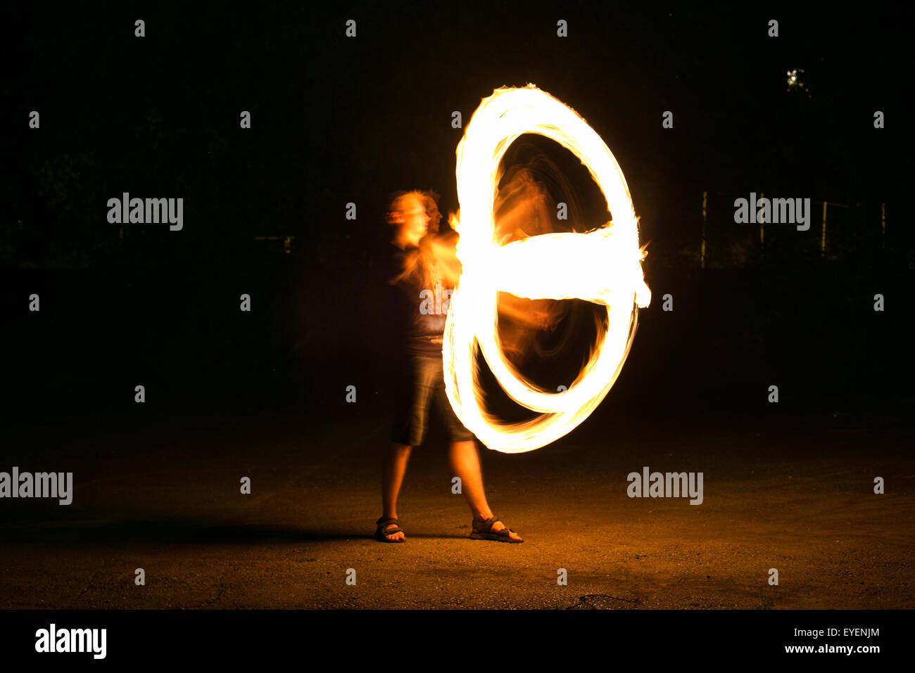 Fire-show man in action Stock Photo - Alamy