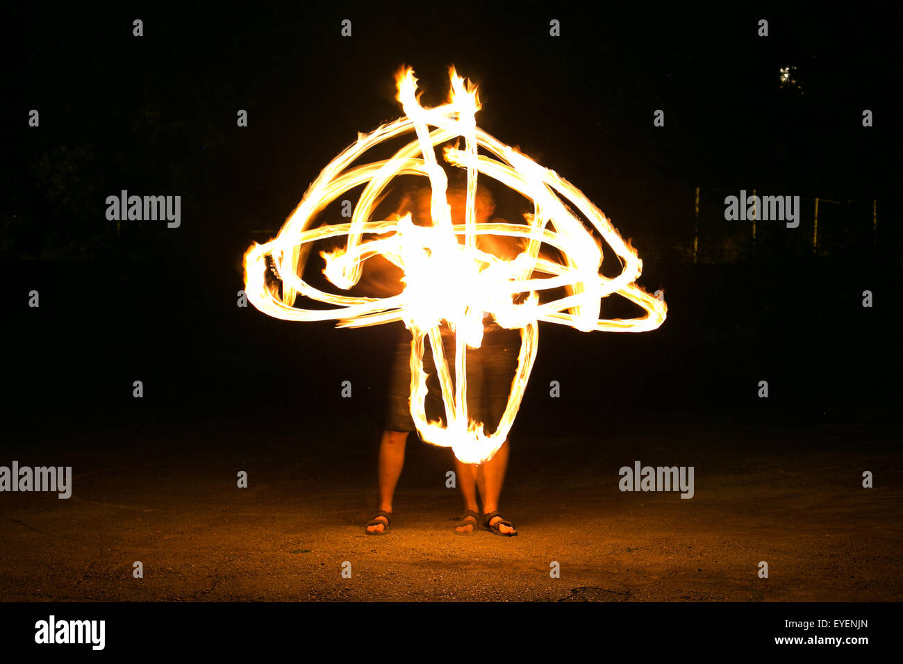 Fire-show man in action Stock Photo - Alamy