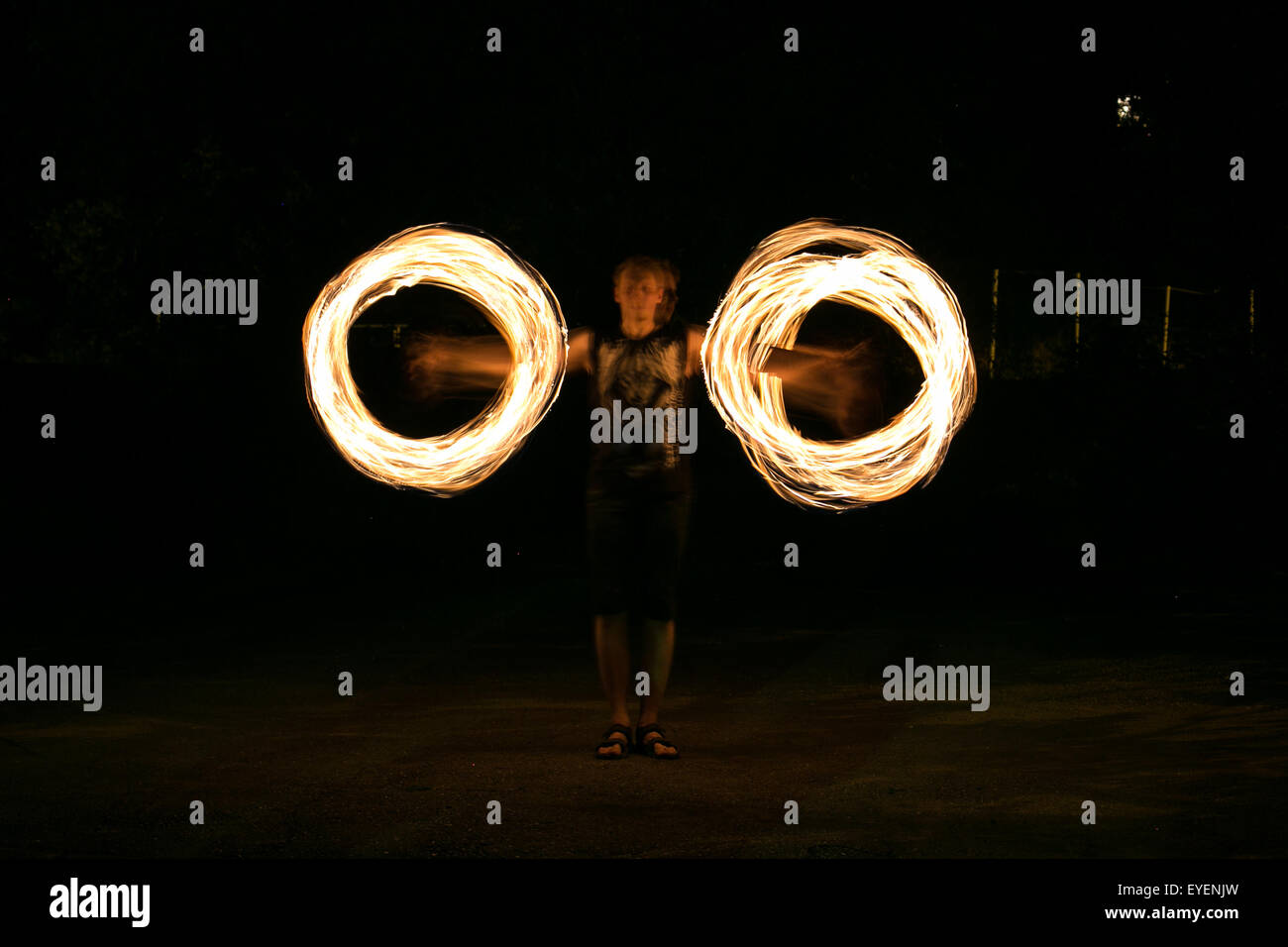 Fire-show man in action Stock Photo - Alamy