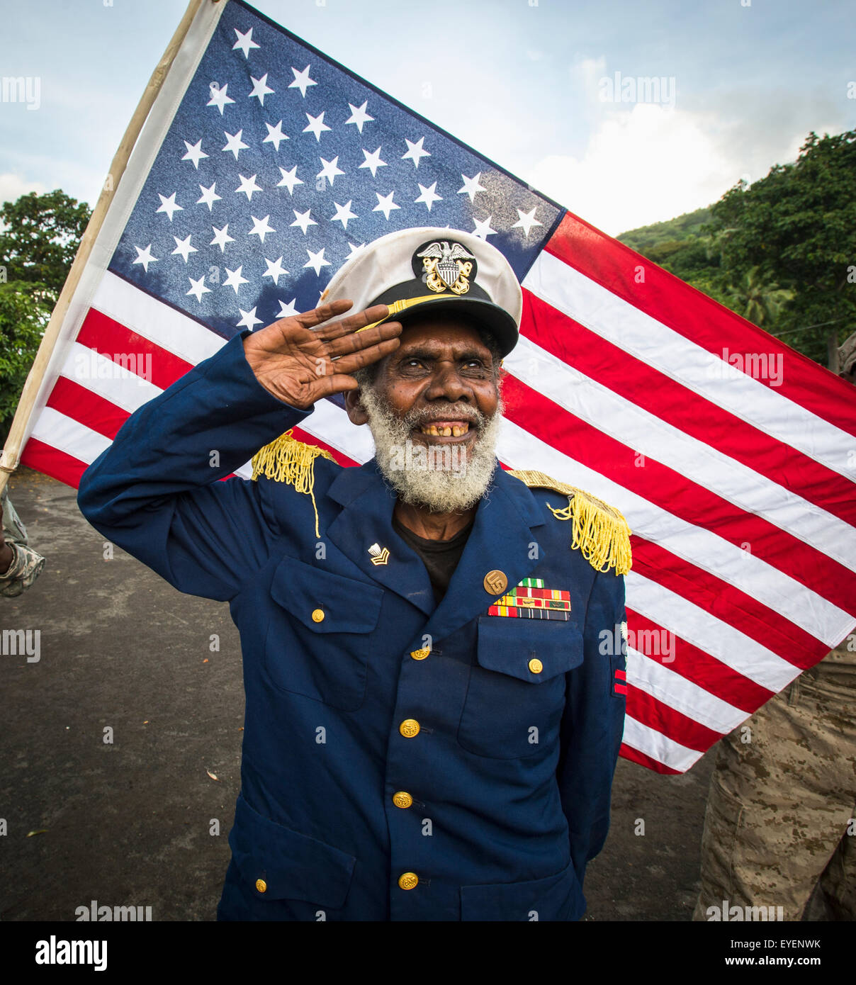 Leader of the Jon Frum Cargo cult saluting the American Flag; Tanna ...